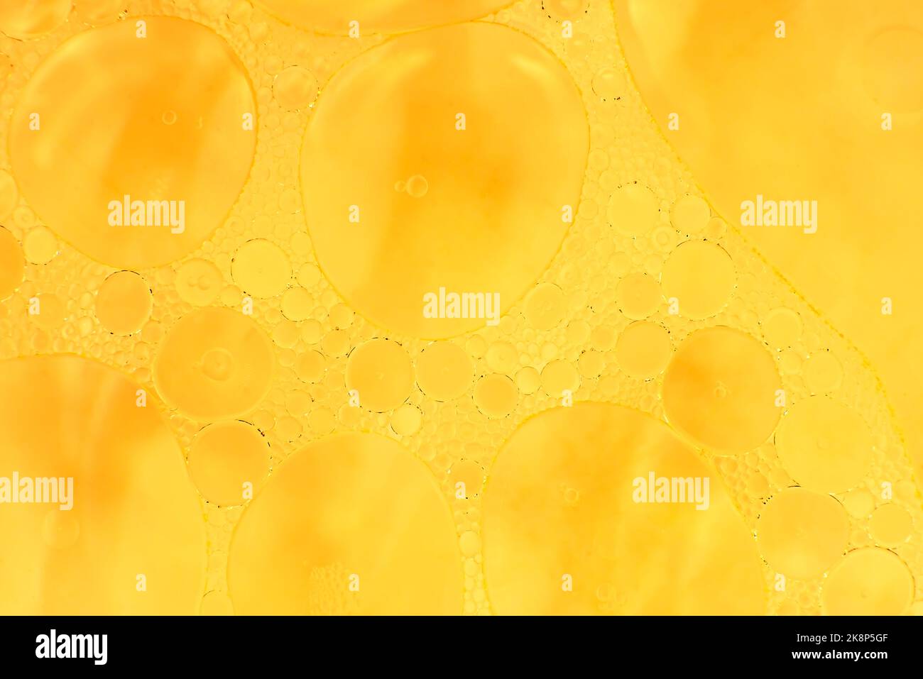 Drops of fat in water. Bubbles of fat close up. Oil Stock Photo - Alamy
