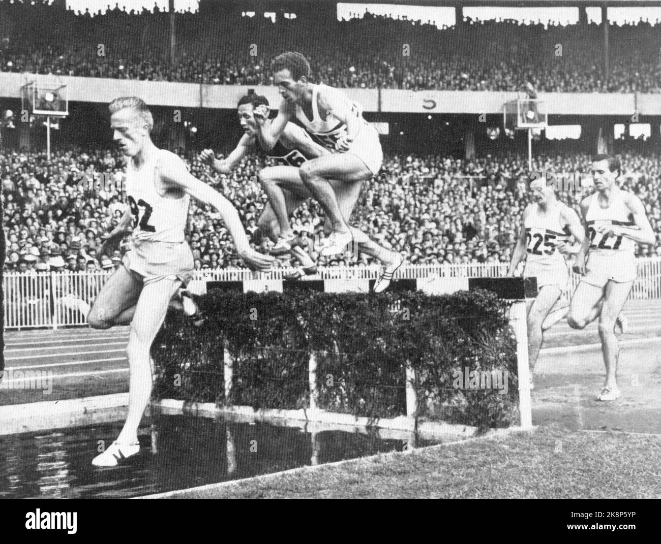 Olympics in Melbourne 1956. Athletics. Ernst Larsen in action, (first ...