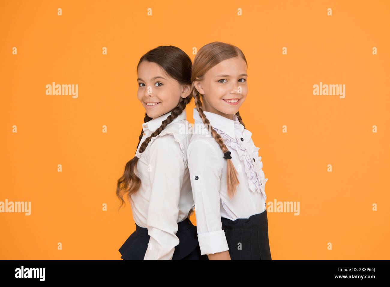 Making everything right. According to school rules. Classmates tidy ...