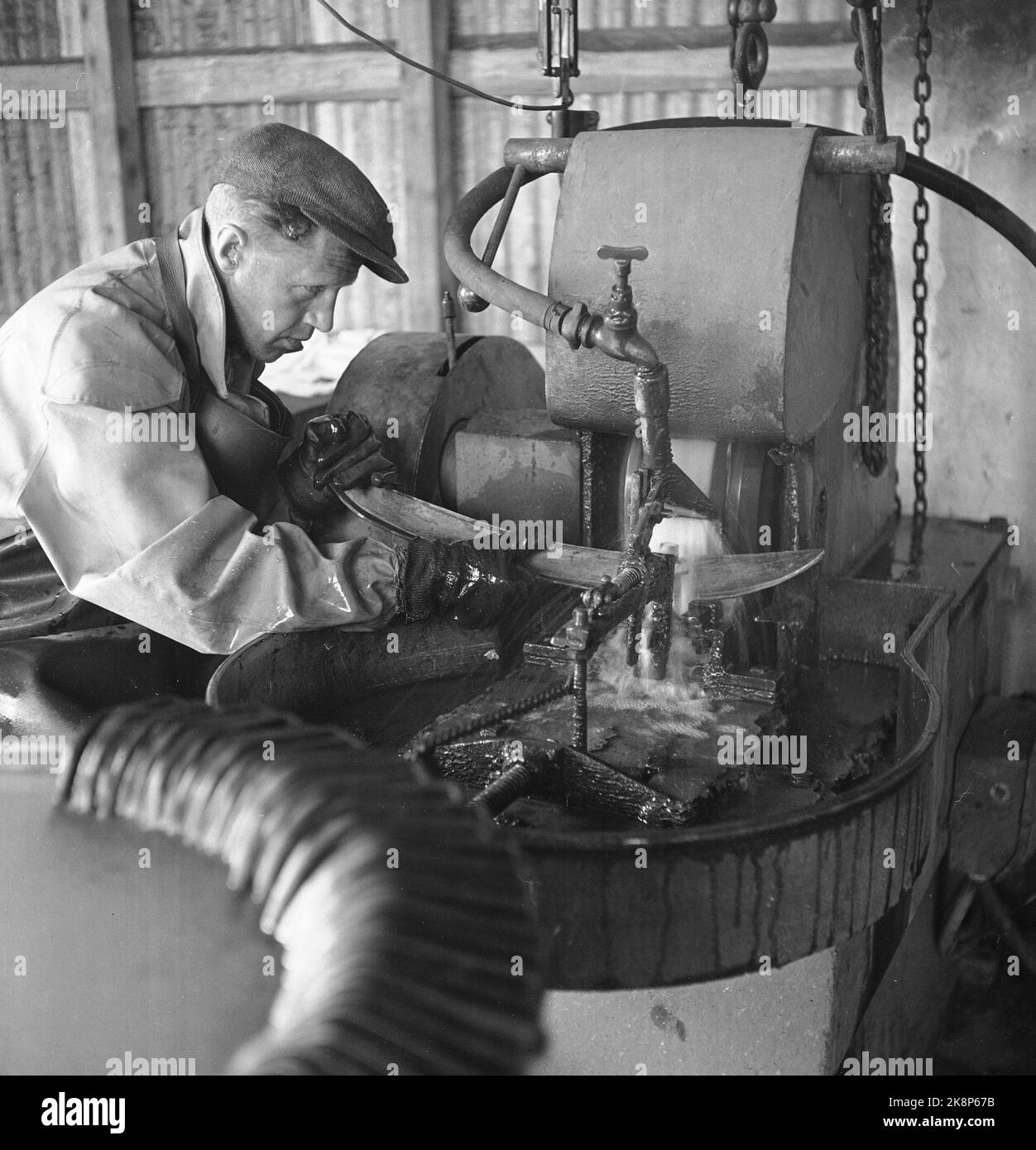 Man grinding the floor Black and White Stock Photos & Images - Alamy