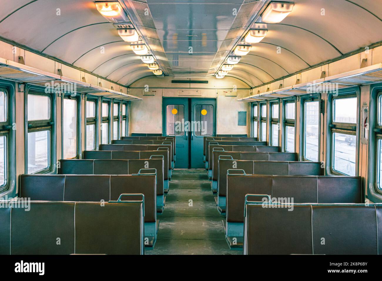 Empty cabin of old passenger electric train. Empty leather seats train ...