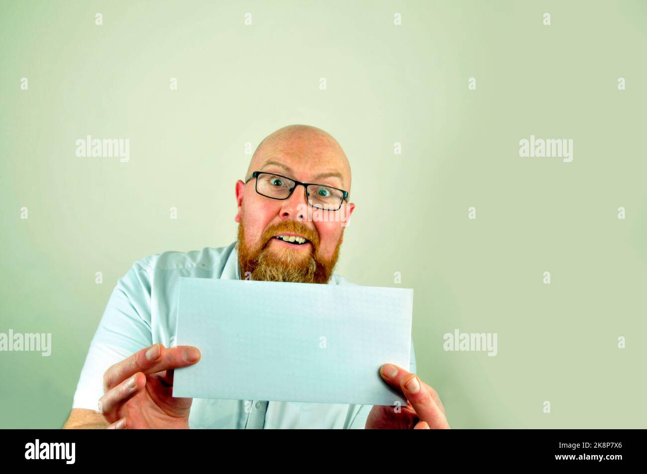 man holding sign Stock Photo - Alamy