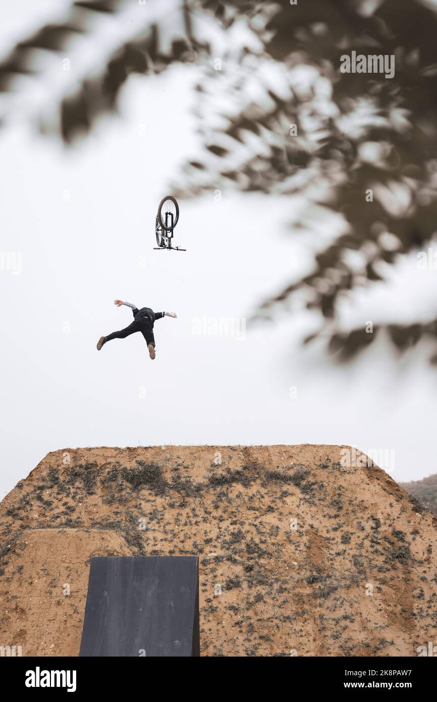 Man on bike hero flying through the air like superman fail crash Stock ...