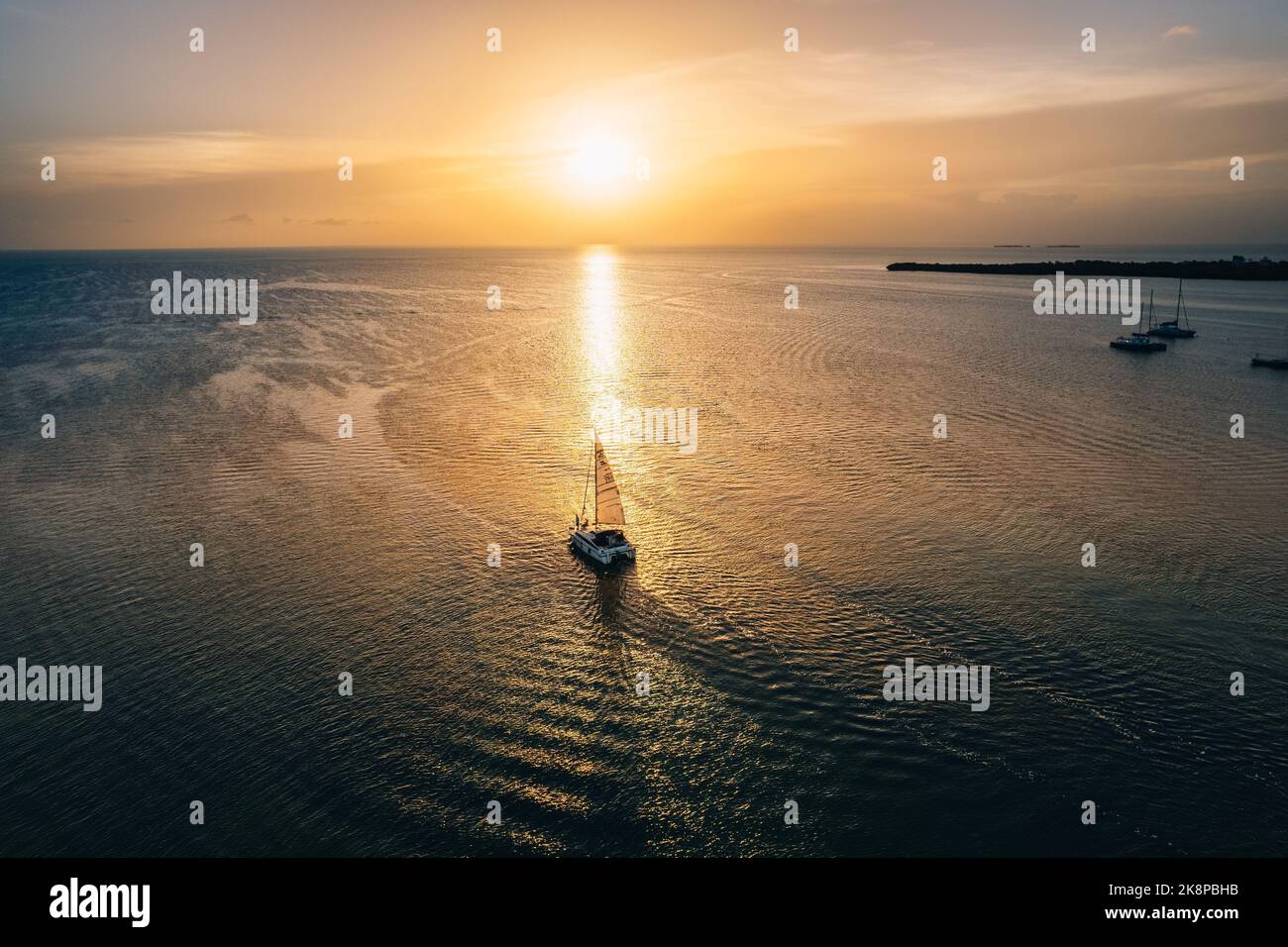 An aerial shot of the split at Caye Caulker, Belize at sunset, perfect ...