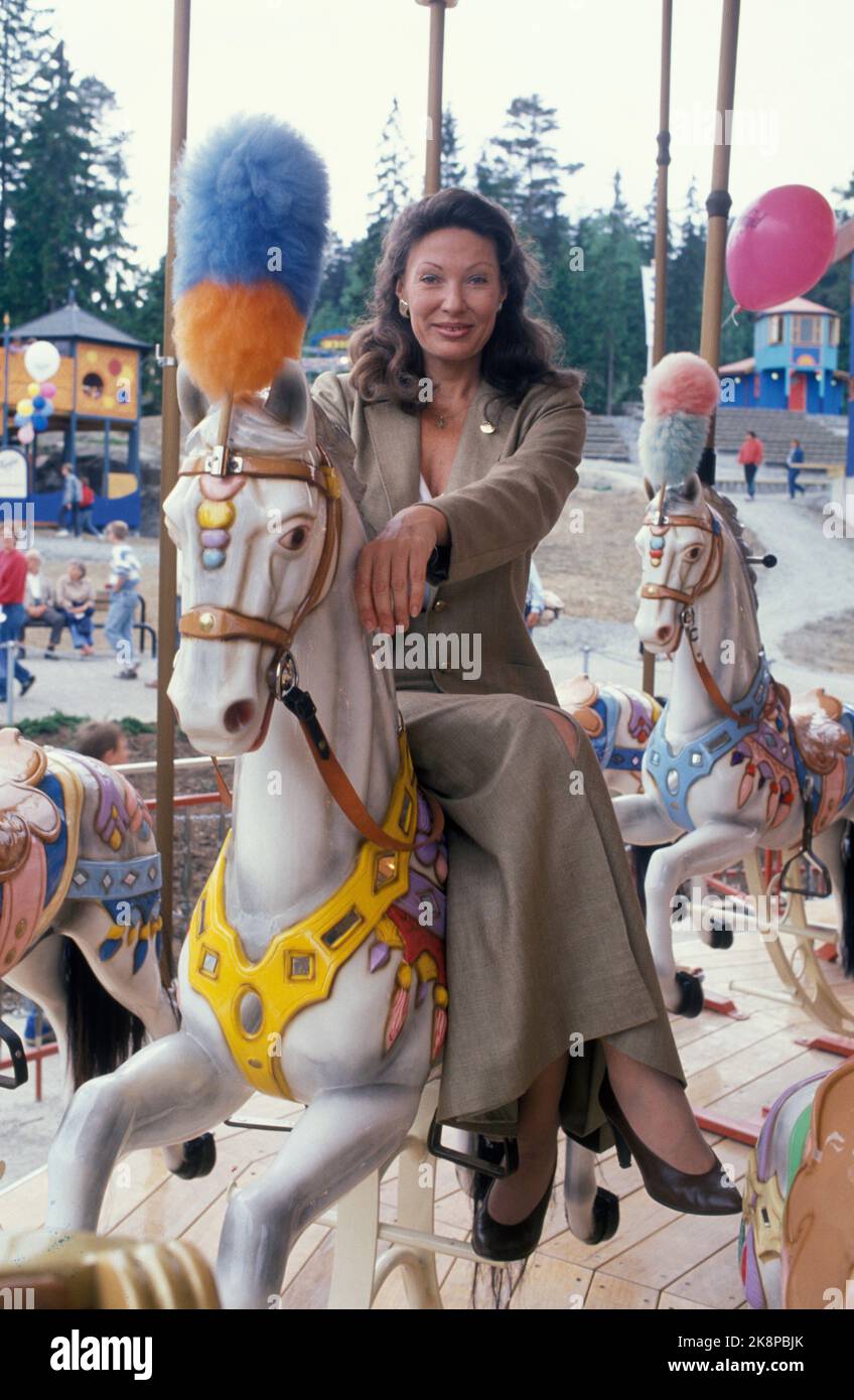 Oslo 19880601 Åse Kleveland on a carousel horse in the "Tusenfryd ...