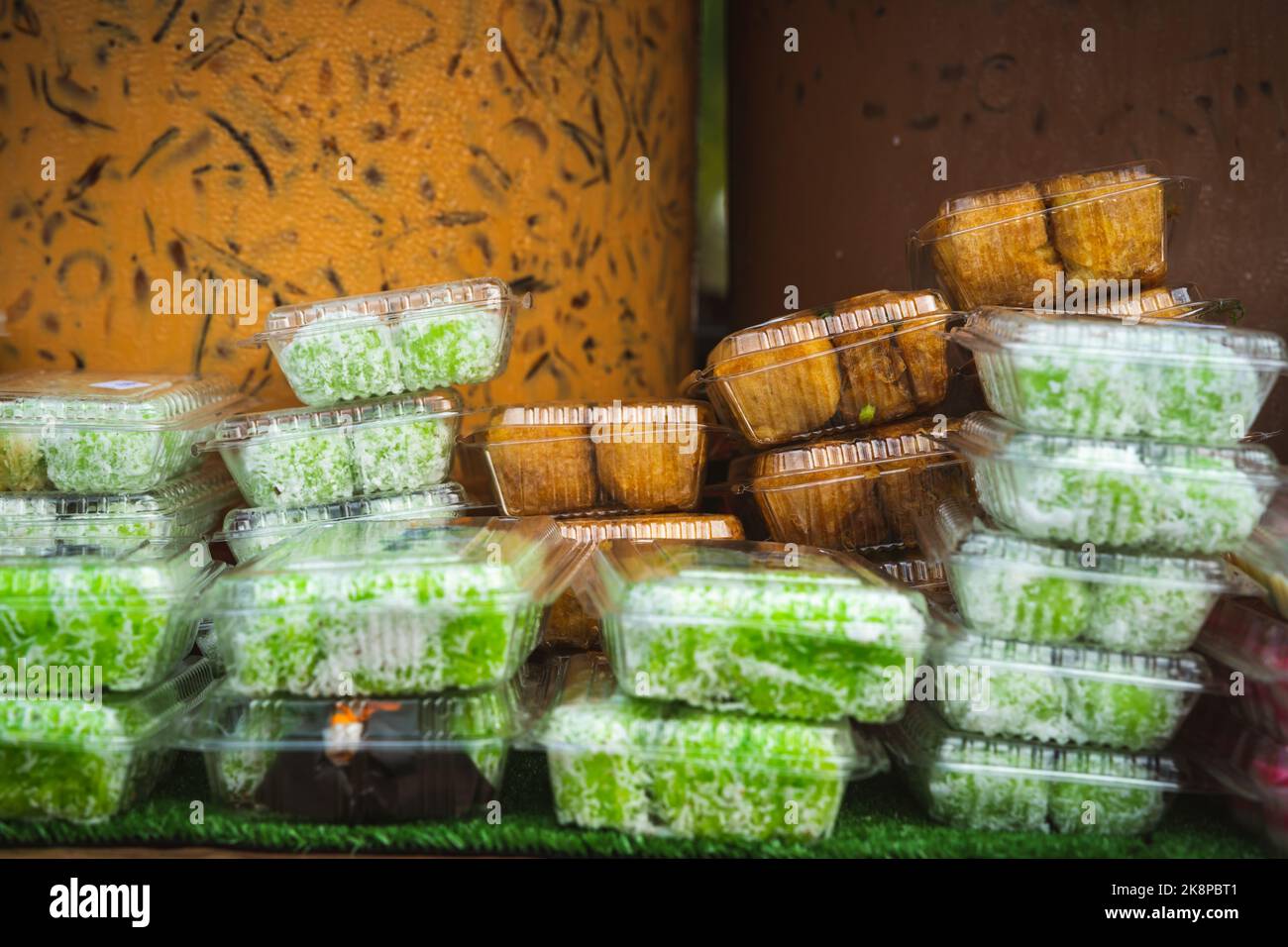 Various kuih-muih packed in a container for sale at the stall Stock ...