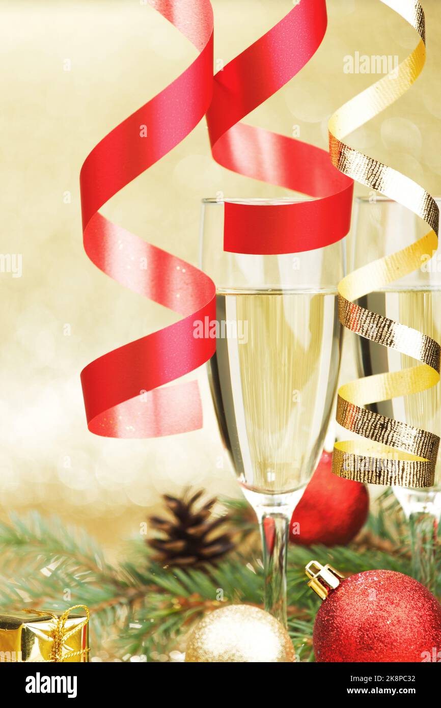 Champagne and christmas decor on glitter background Stock Photo - Alamy