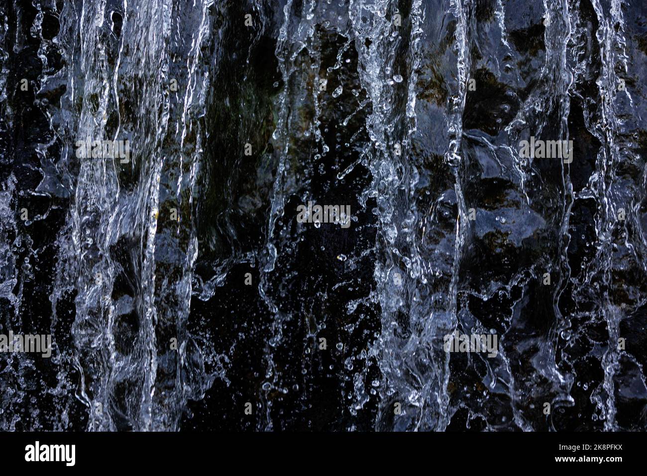 The flow of clean water in the waterfall, close-up, background Stock ...