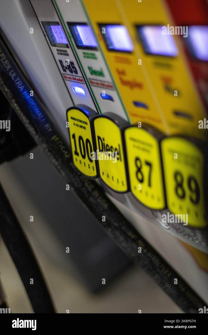 A vertical closeup of gasoline and diesel pumps in a line Stock Photo ...