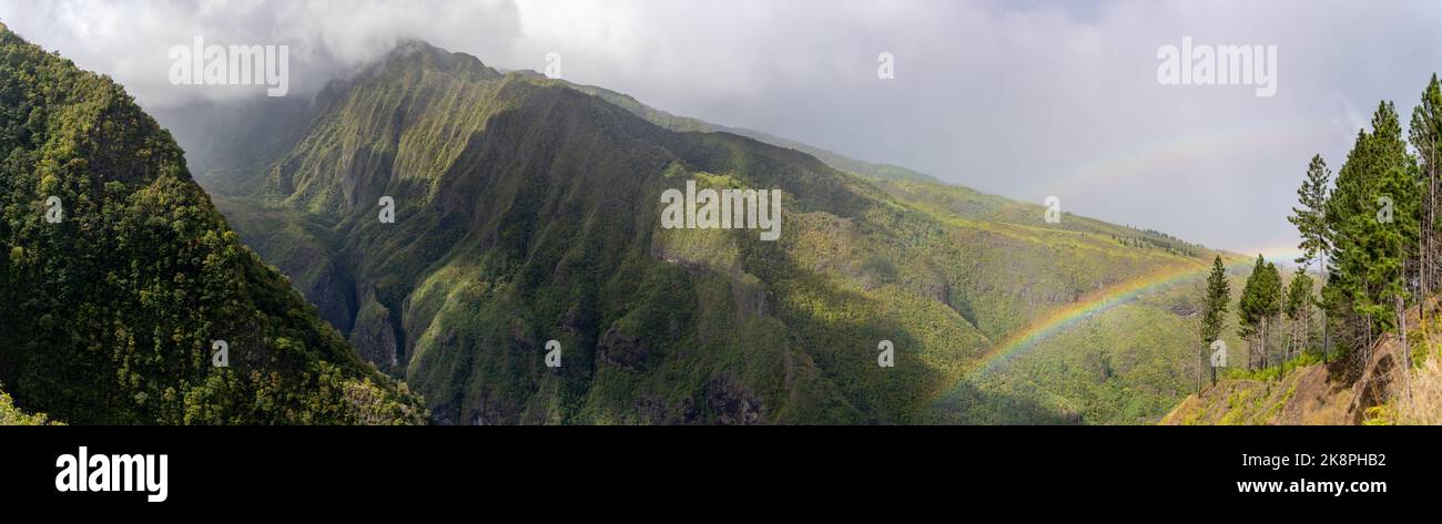 The panoramic view of green mountains and rainbows. Paea, Tahiti ...