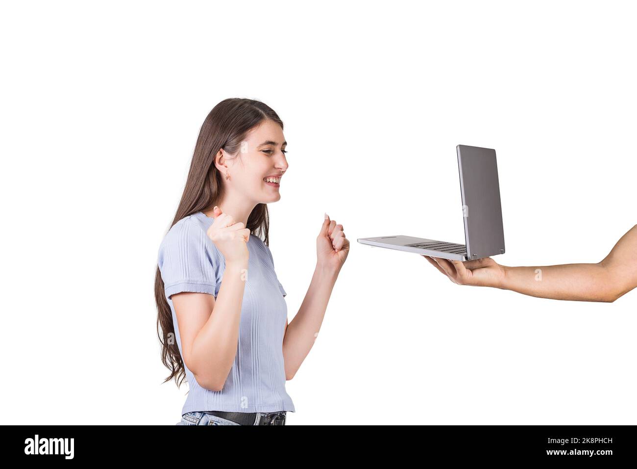 Outstretched person hand holding a laptop showing the screen to a ...