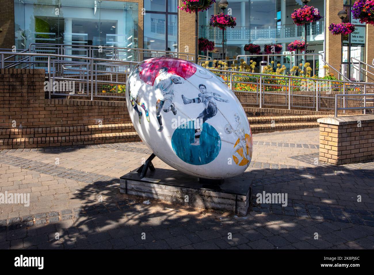 A big Decorated rugby balls in the centre of Rugby city with sunlight ...