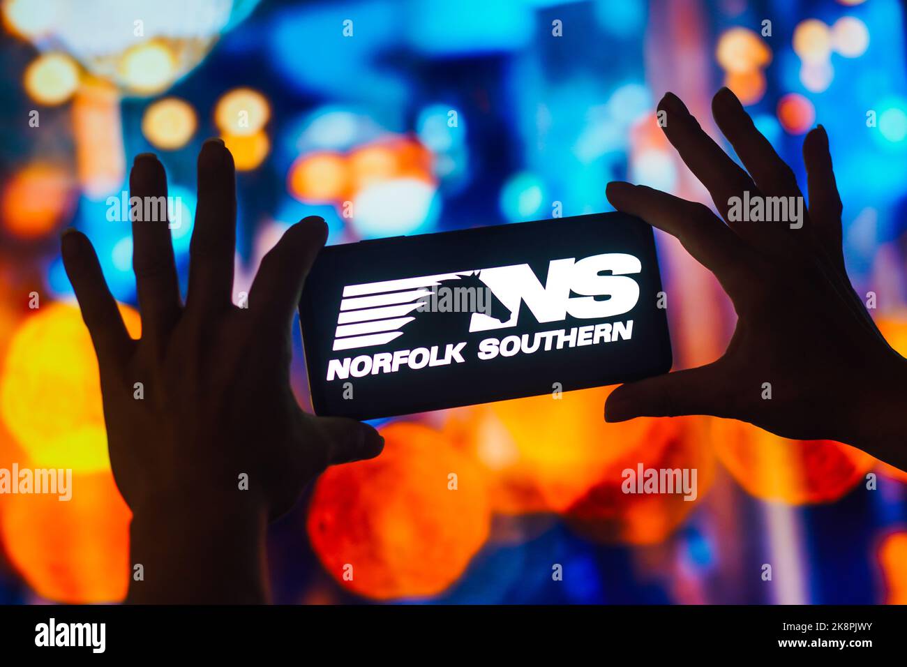 In this photo illustration, the Norfolk Southern Corporation logo is ...