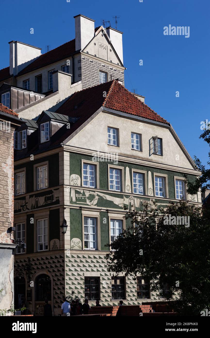 A vertical shot of the historical building facade next to the Barbican ...