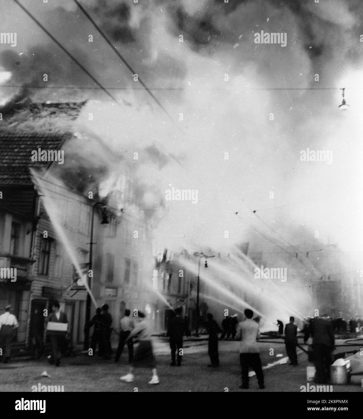 Bergen 19550705. Fire at German bridge in Bergen. The pier in Bergen is ...