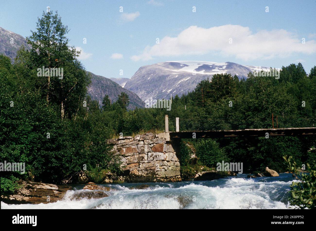 Stardalen in Jølster. Nature picture, stiff river with old bridge over ...