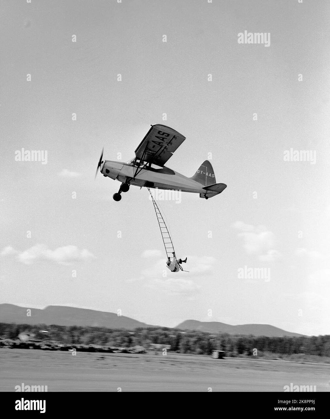 Hanging of a rope Black and White Stock Photos & Images - Alamy