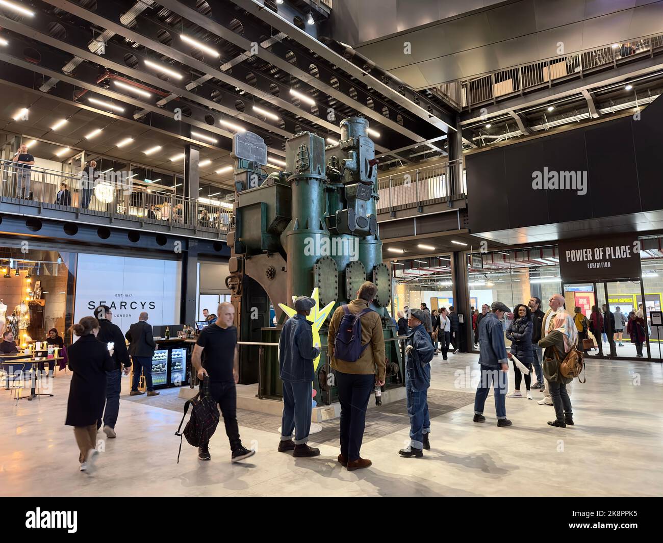 Crowded shopping mall inside the Battersea Power Station in London ...