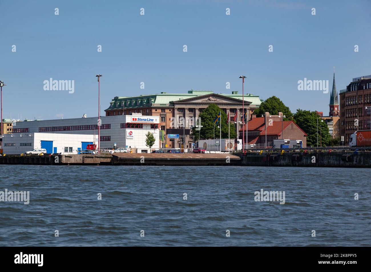 The harbor on Gota alv river with buildings on blue sky background ...