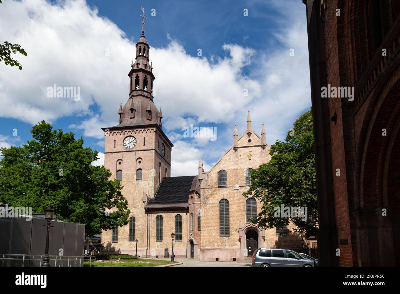 The facade of the single clock tower of Oslo Cathedral, Norway Stock ...