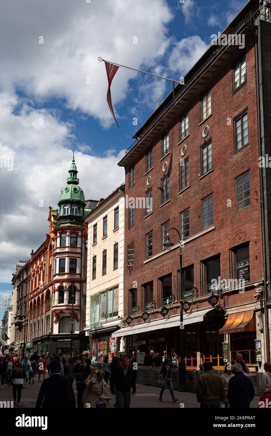 The tourists walking along historical building at Karls Johan gate ...