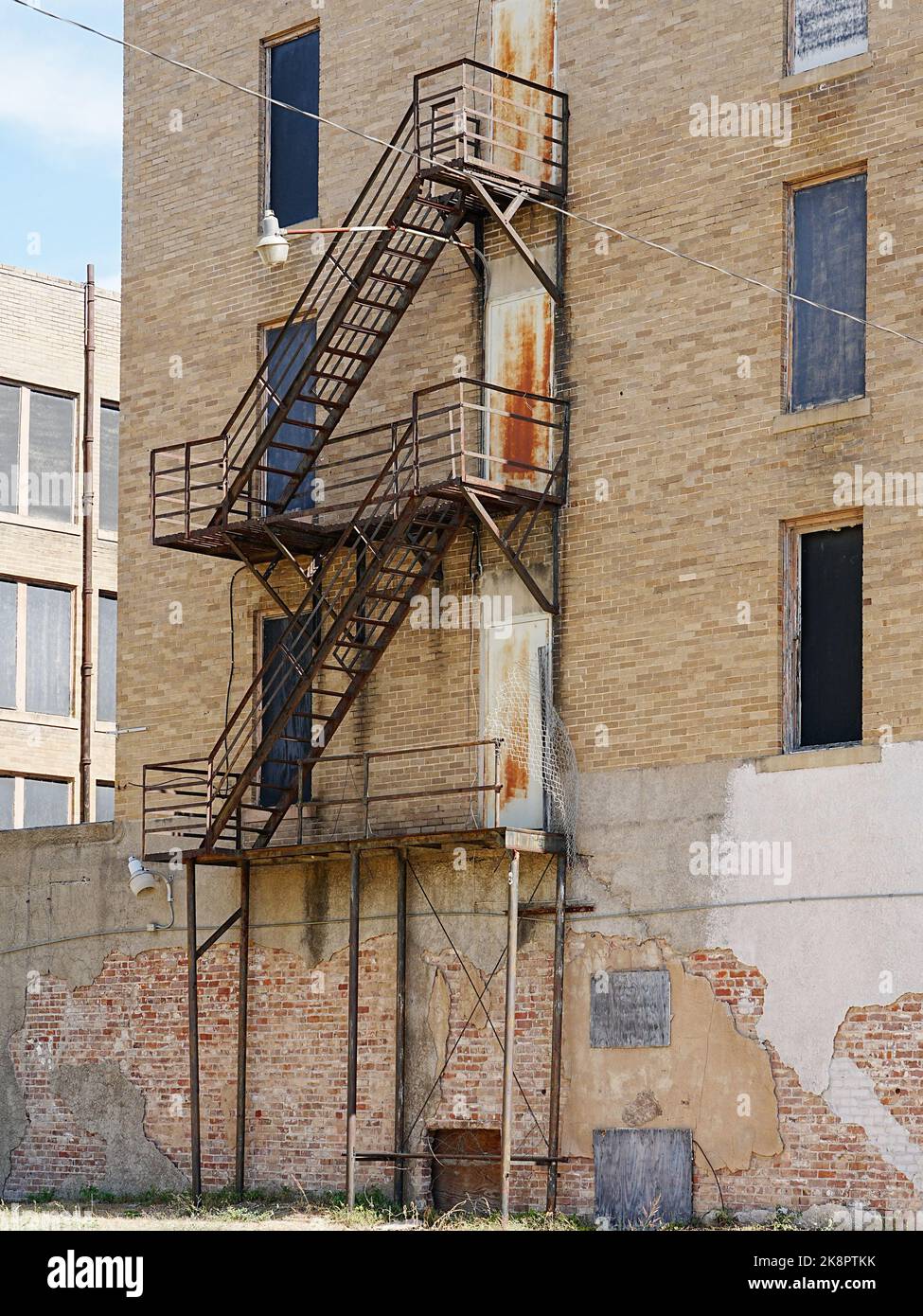 Taylor, Texas USA - Steel fire escape ladder on side of old abandoned ...