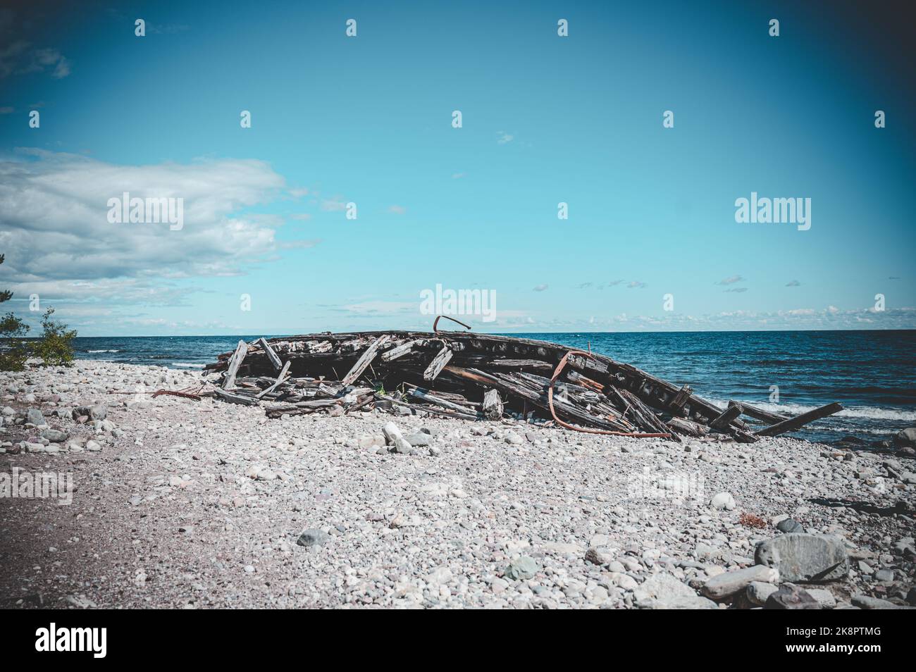 The remains of a destroyed boat on the beach Stock Photo - Alamy