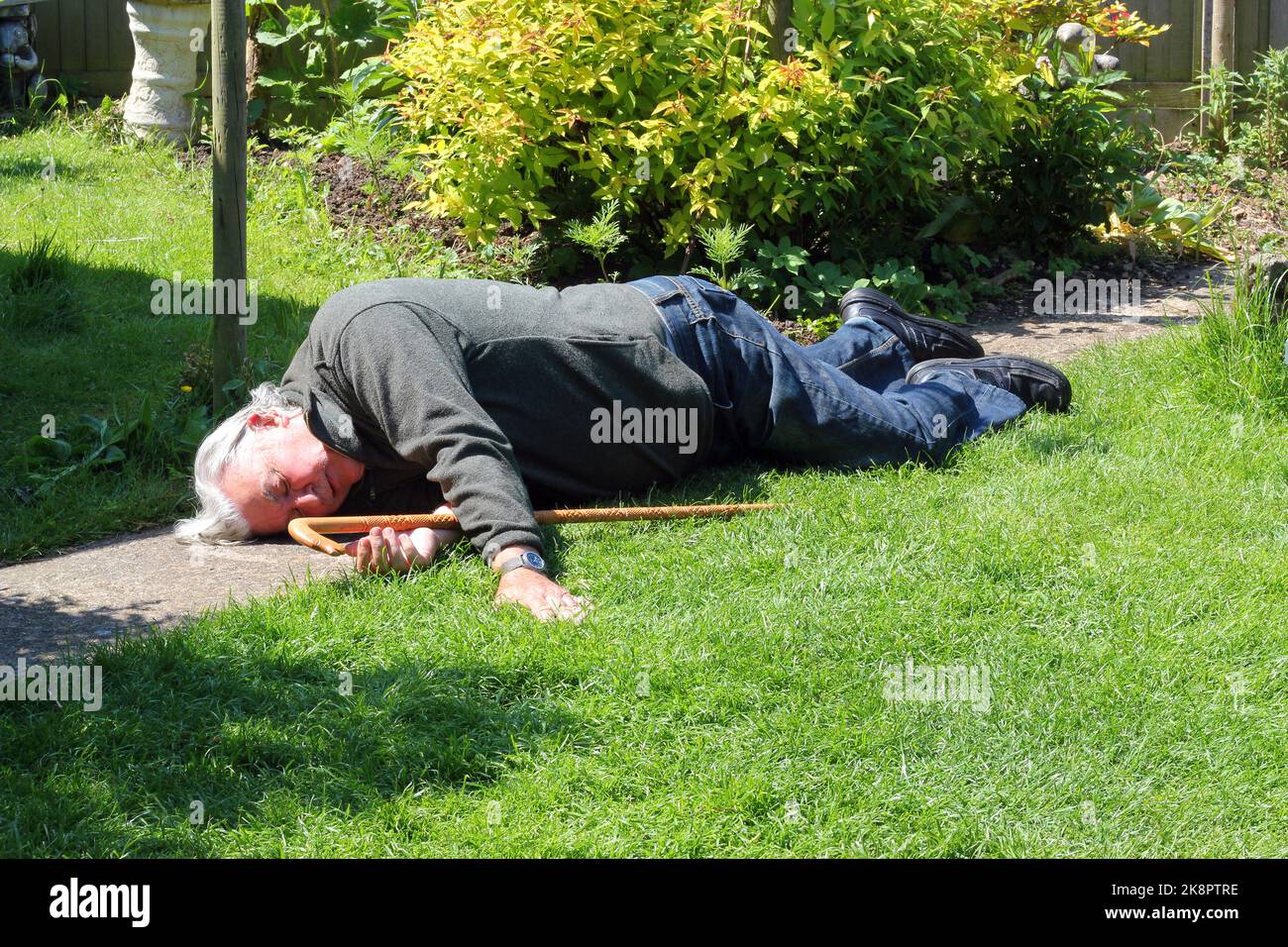 Elderly man Collapsed. Unconscious or Dead Stock Photo - Alamy