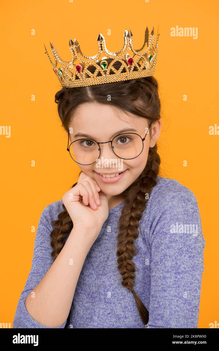 Adorable girl in glasses. Happy smiling princess. Excellent pupil ...