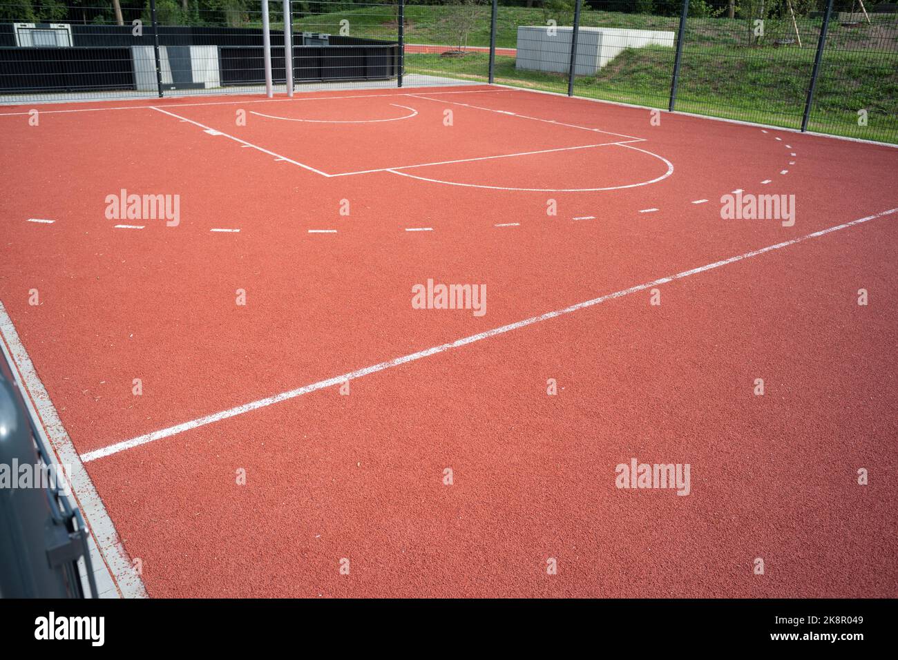 The view of an outdoor basketball court in a sports center - rubber ...