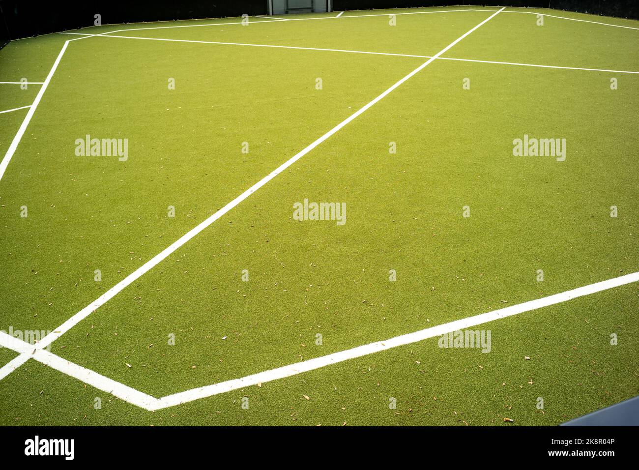 The view of a baseball field in a competition center - green rubber ...