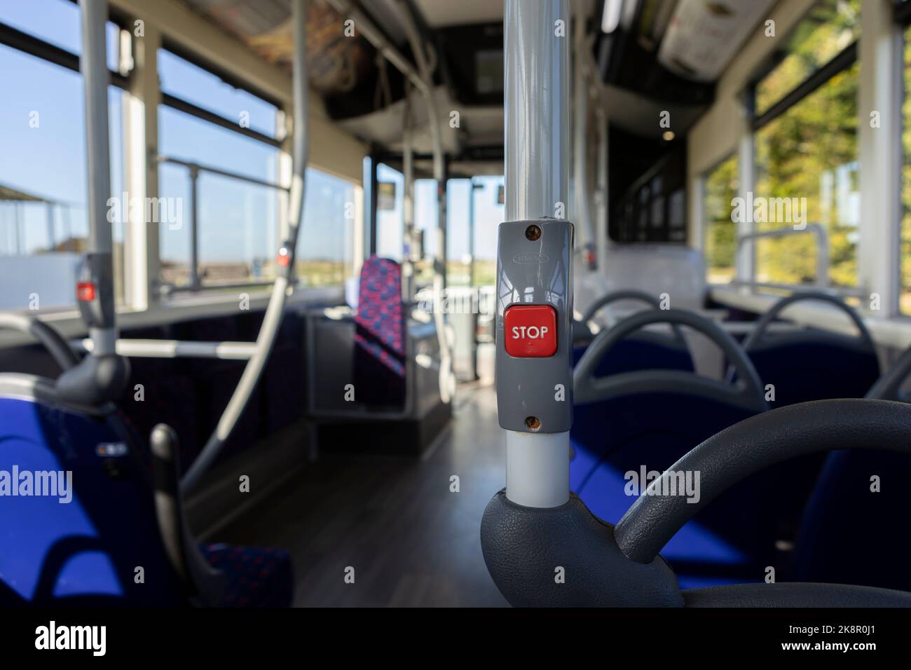 close up of a stop button inside a public transport vehicle, request to ...