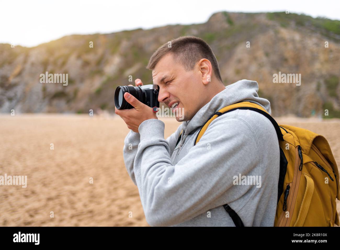 Traveler photographer takes photo beautiful seascape landscape on ...