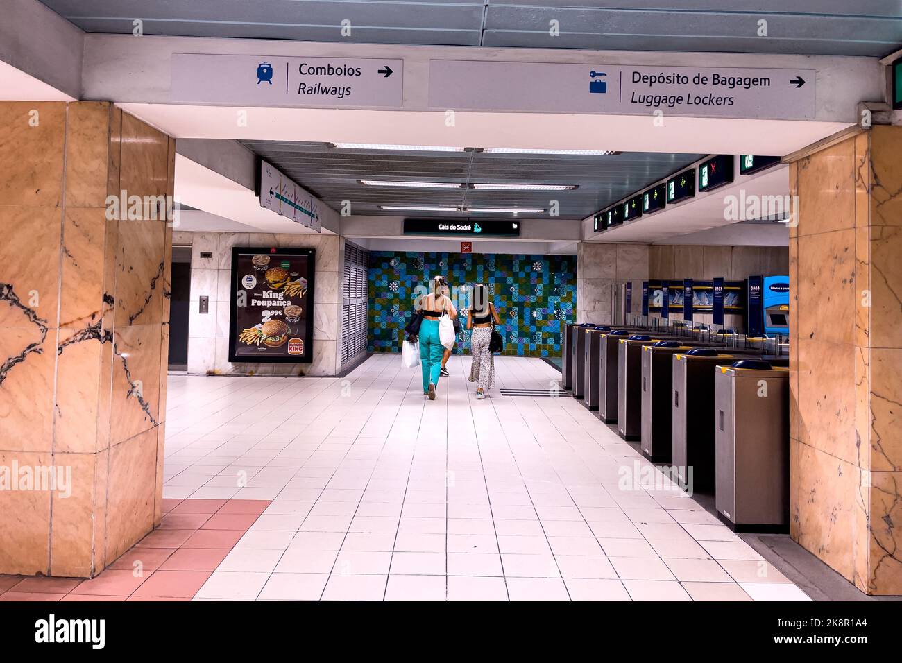 People walking inside a metro station Stock Photo - Alamy