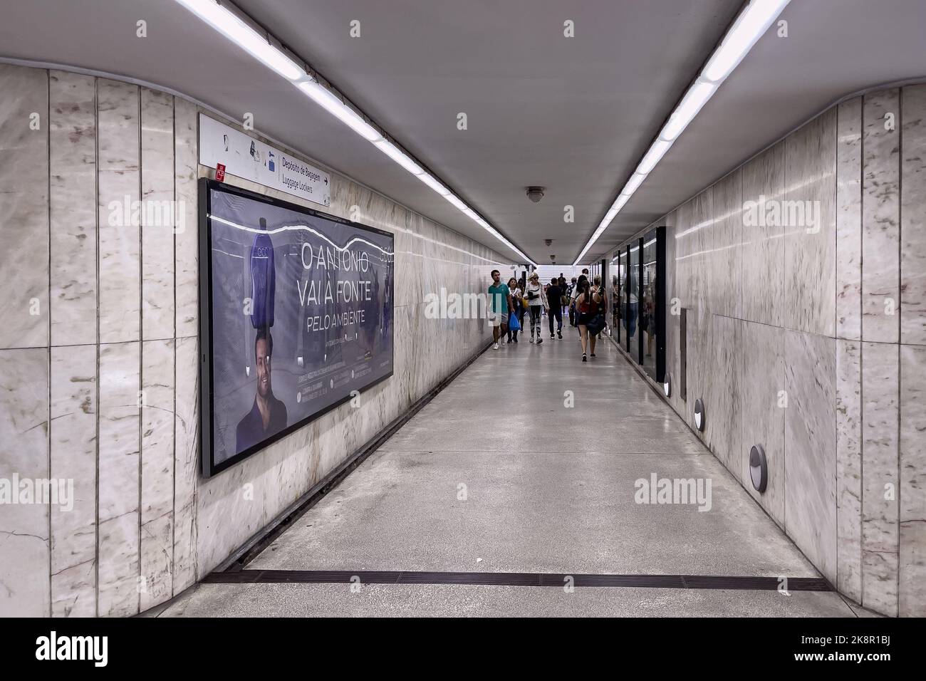 People walking inside a metro station Stock Photo - Alamy
