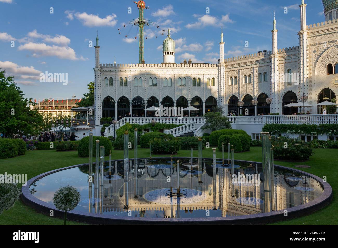 The view of a pond and Moorish Palace in Tivoli Park. Copenhagen ...