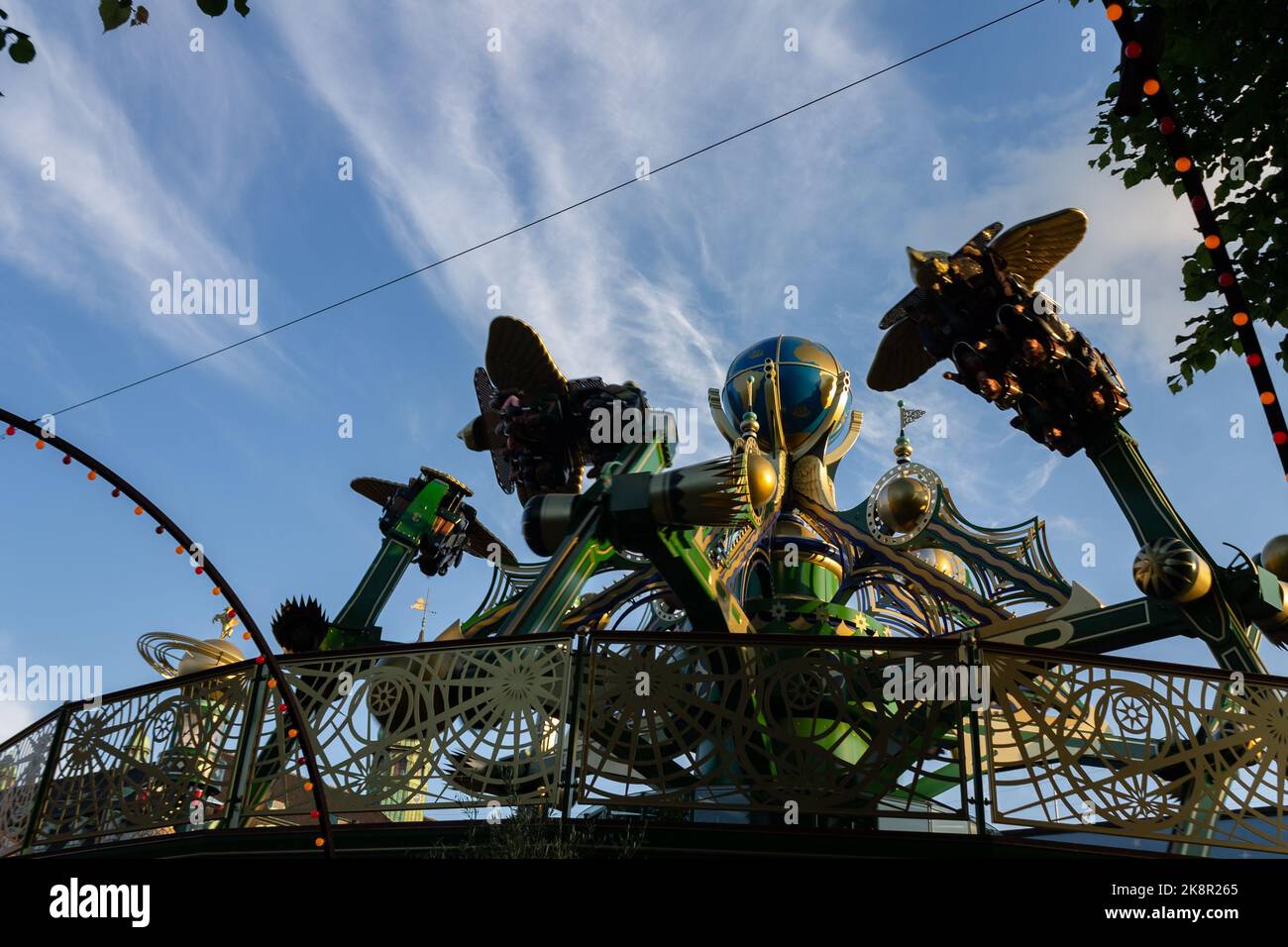 The spinning ride in Tivoli Park. Copenhagen, Denmark Stock Photo - Alamy