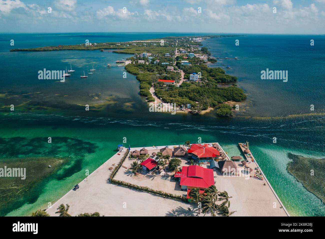 A gorgeous aerial view of the Split in Caye Caulker, Belize with ...