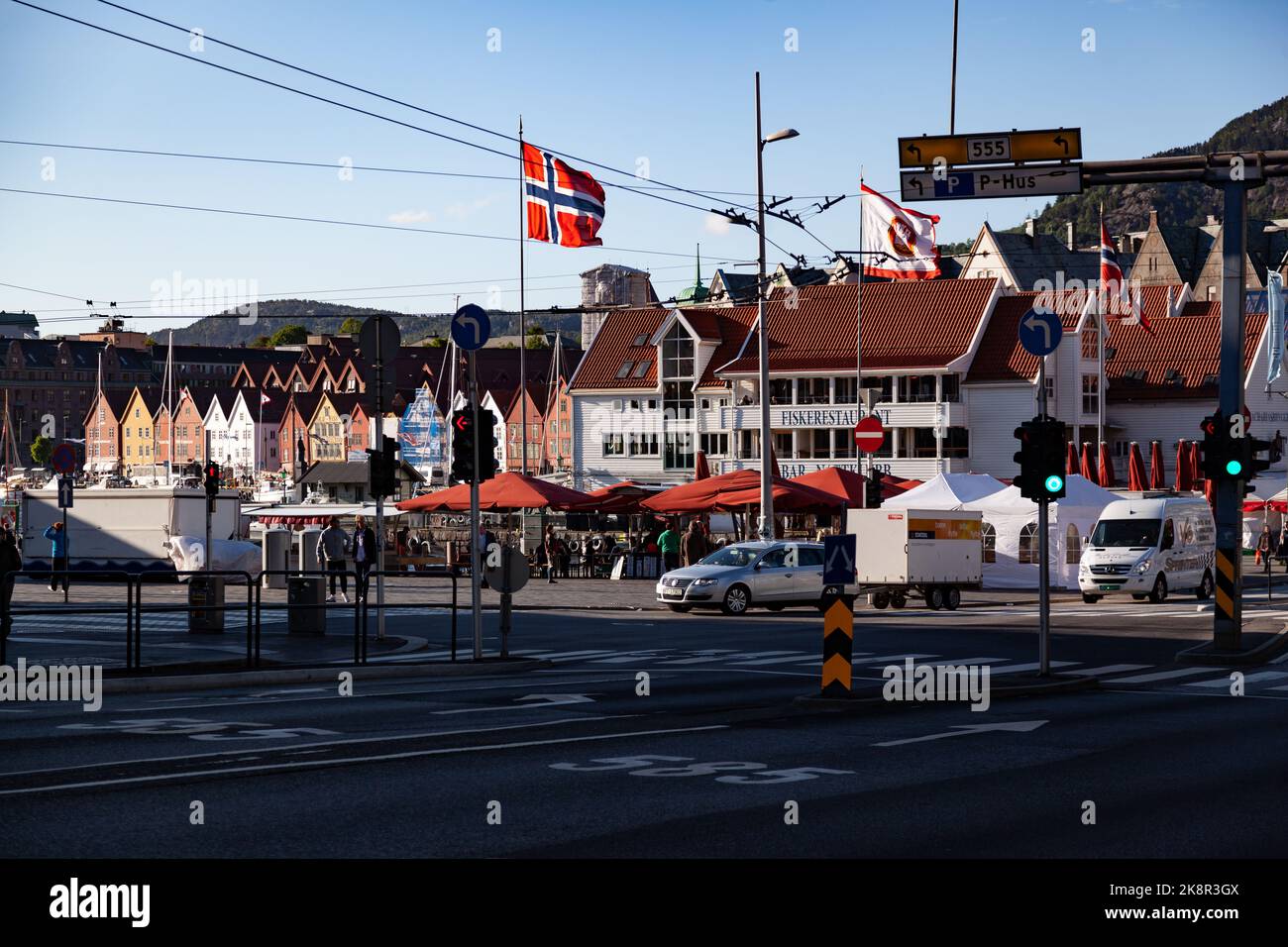 The Norwegian flag along the wood historical buildings and other ...