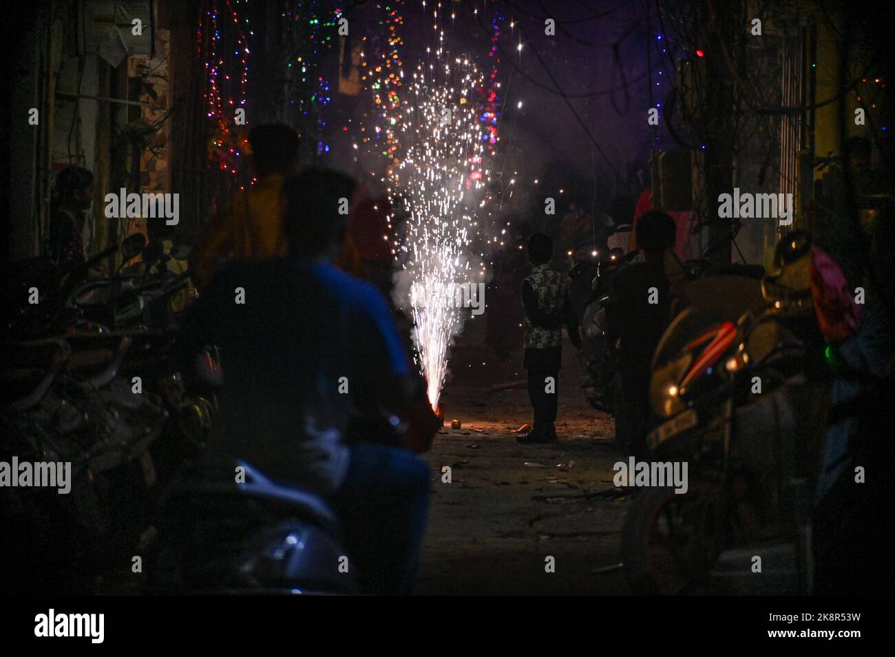 New Delhi, Delhi, India. 24th Oct, 2022. People light firecrackers amid ...