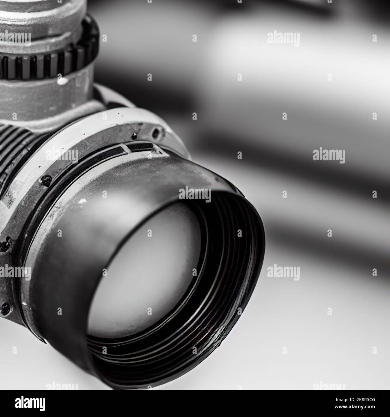 A grayscale closeup shot of the lens of a professional vintage camera ...