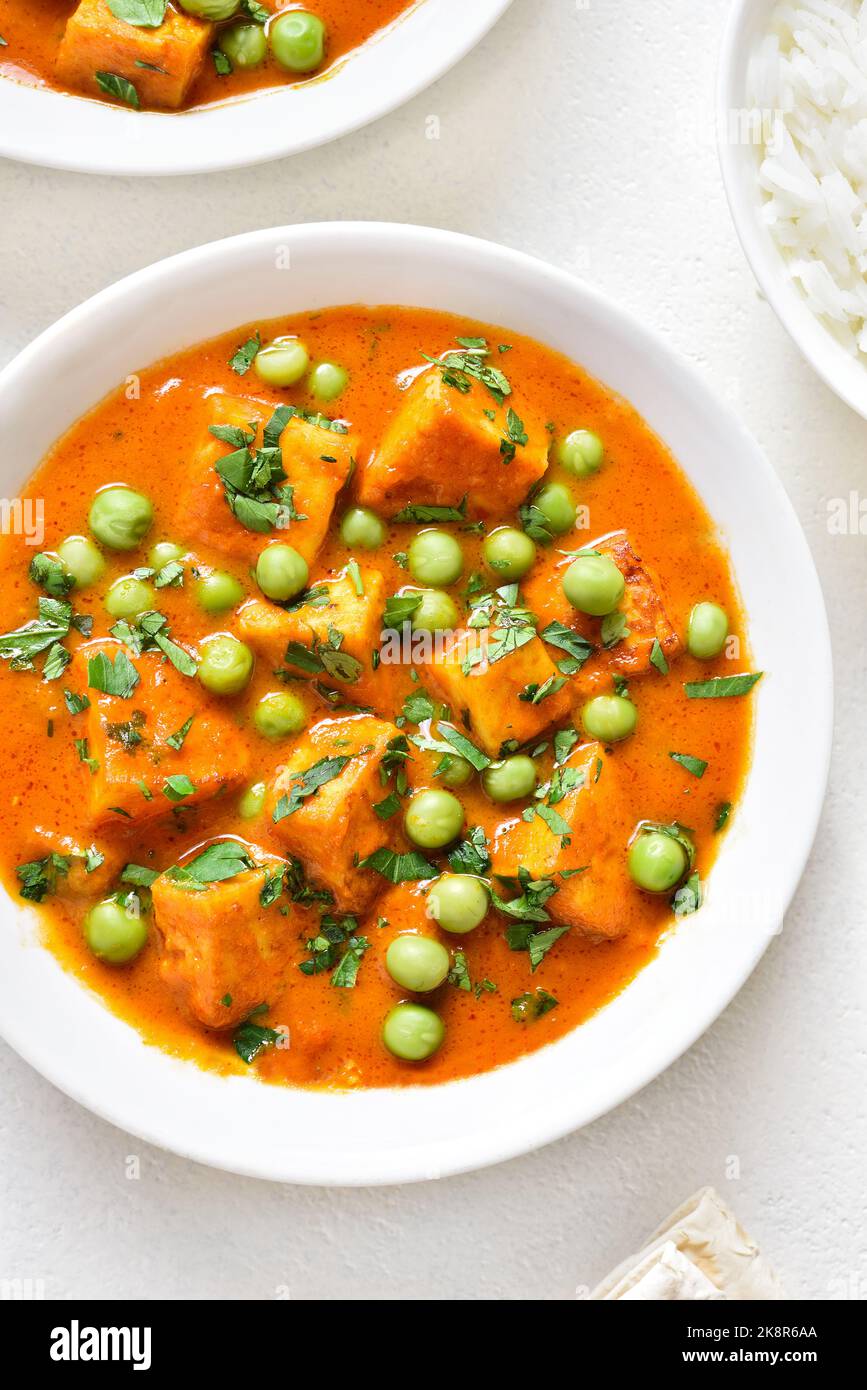 Paneer butter masala. Indian style cottage cheese curry in bowl over ...