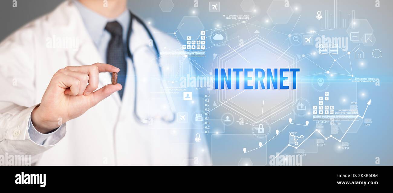 Doctor giving a pill concept Stock Photo - Alamy