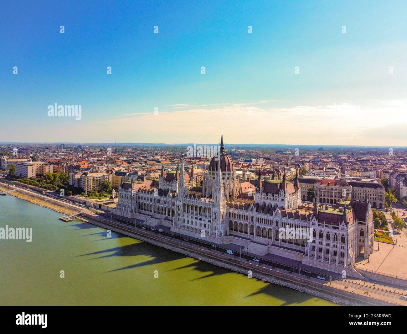 An aerial view of Hungarian Parliament Building reflecting on the river ...