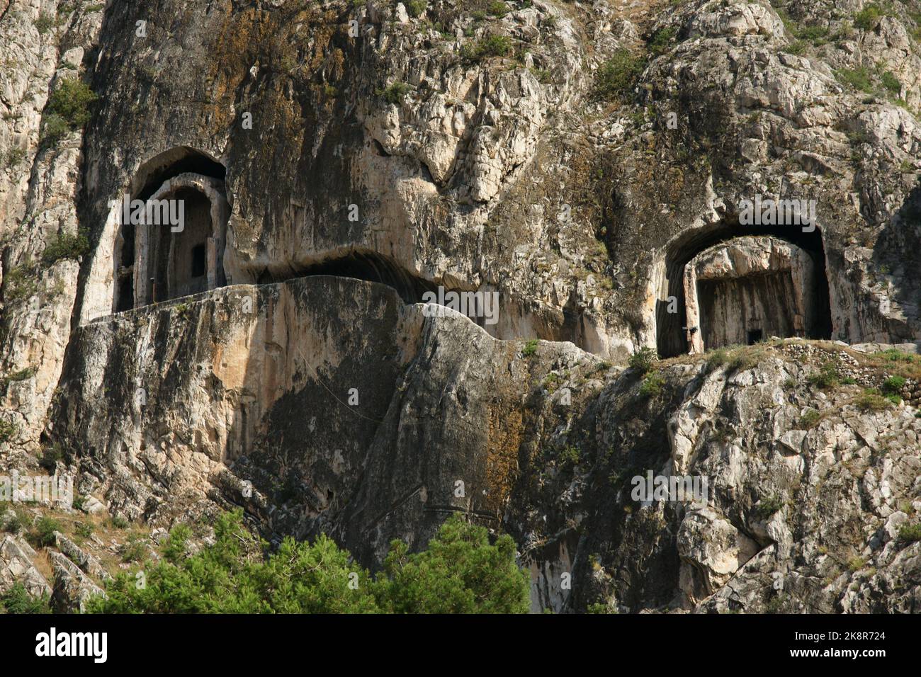 These rock tombs in Amasya Castle in Turkey are from the ancient period ...