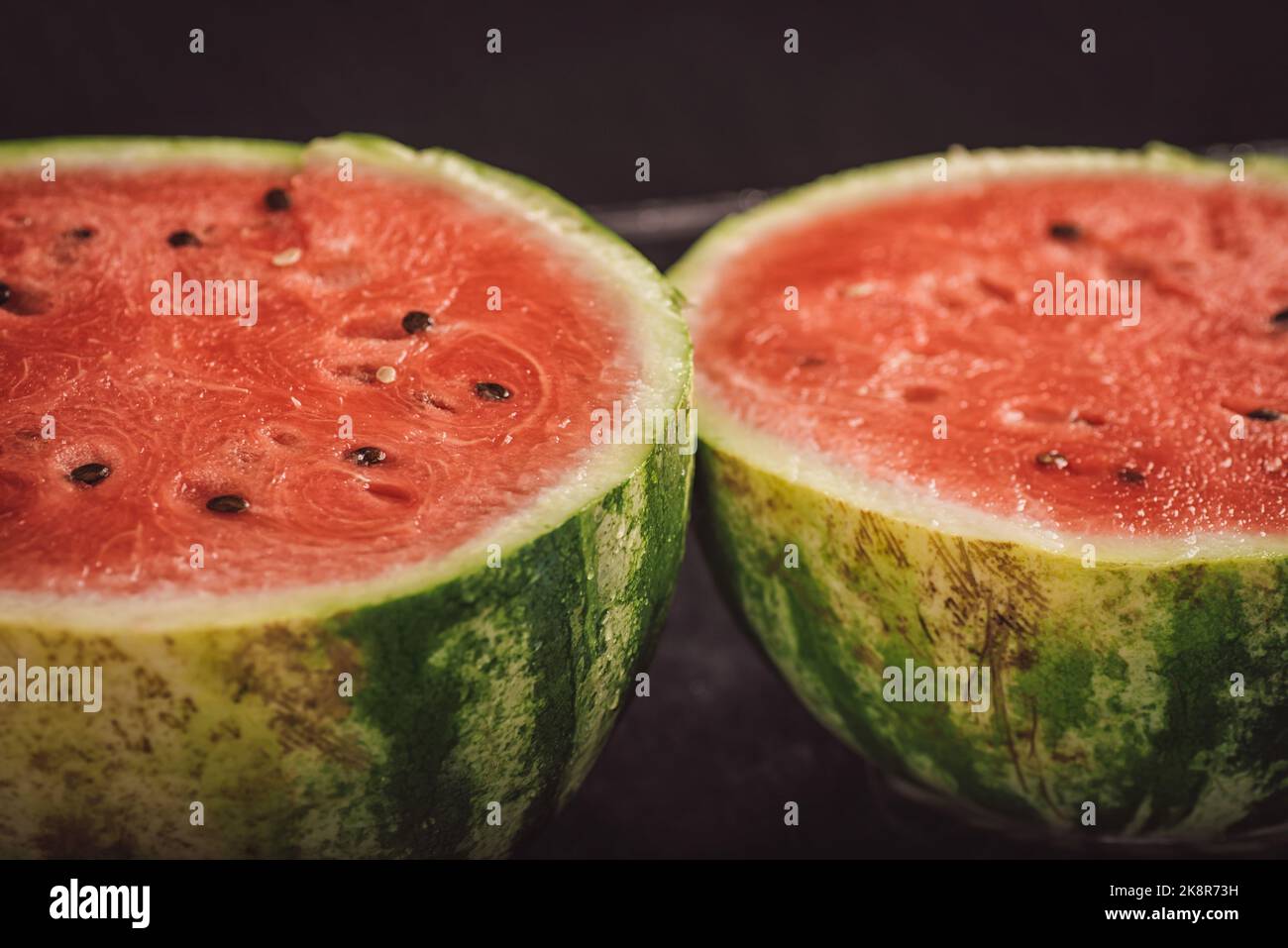 A closeip of halved red delicious watermelons Stock Photo - Alamy