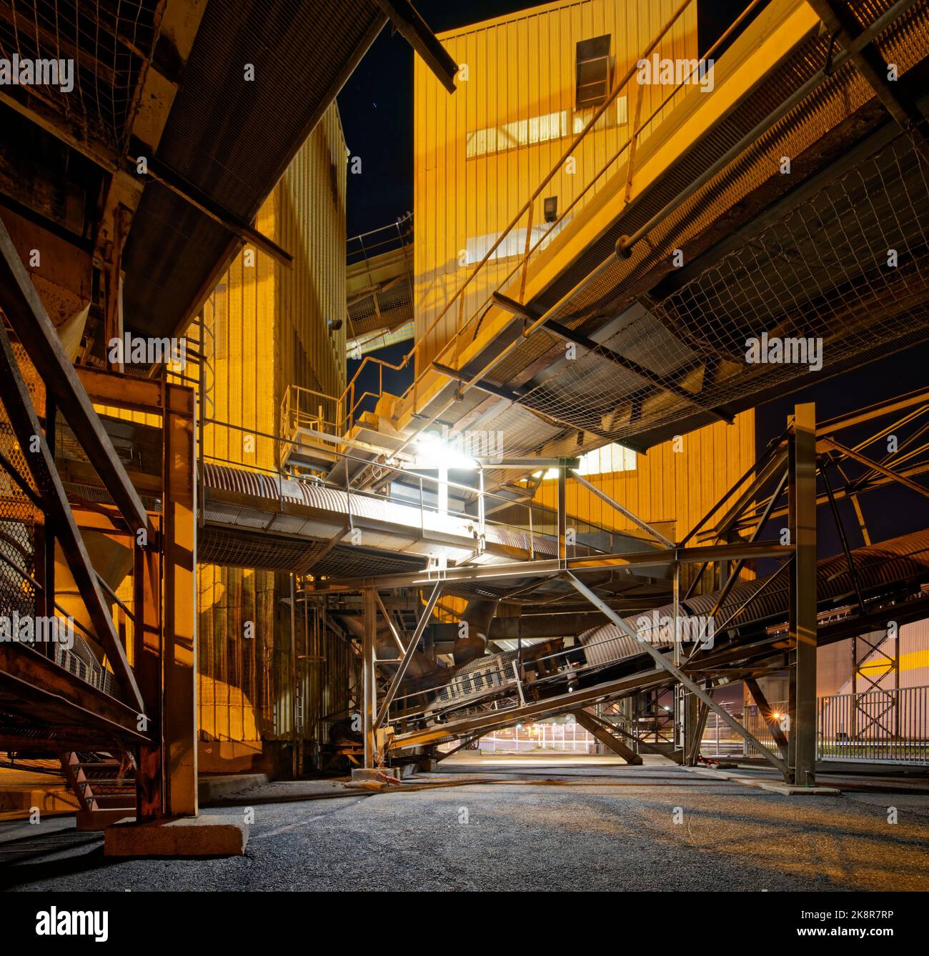 The factory work in the night Stock Photo - Alamy