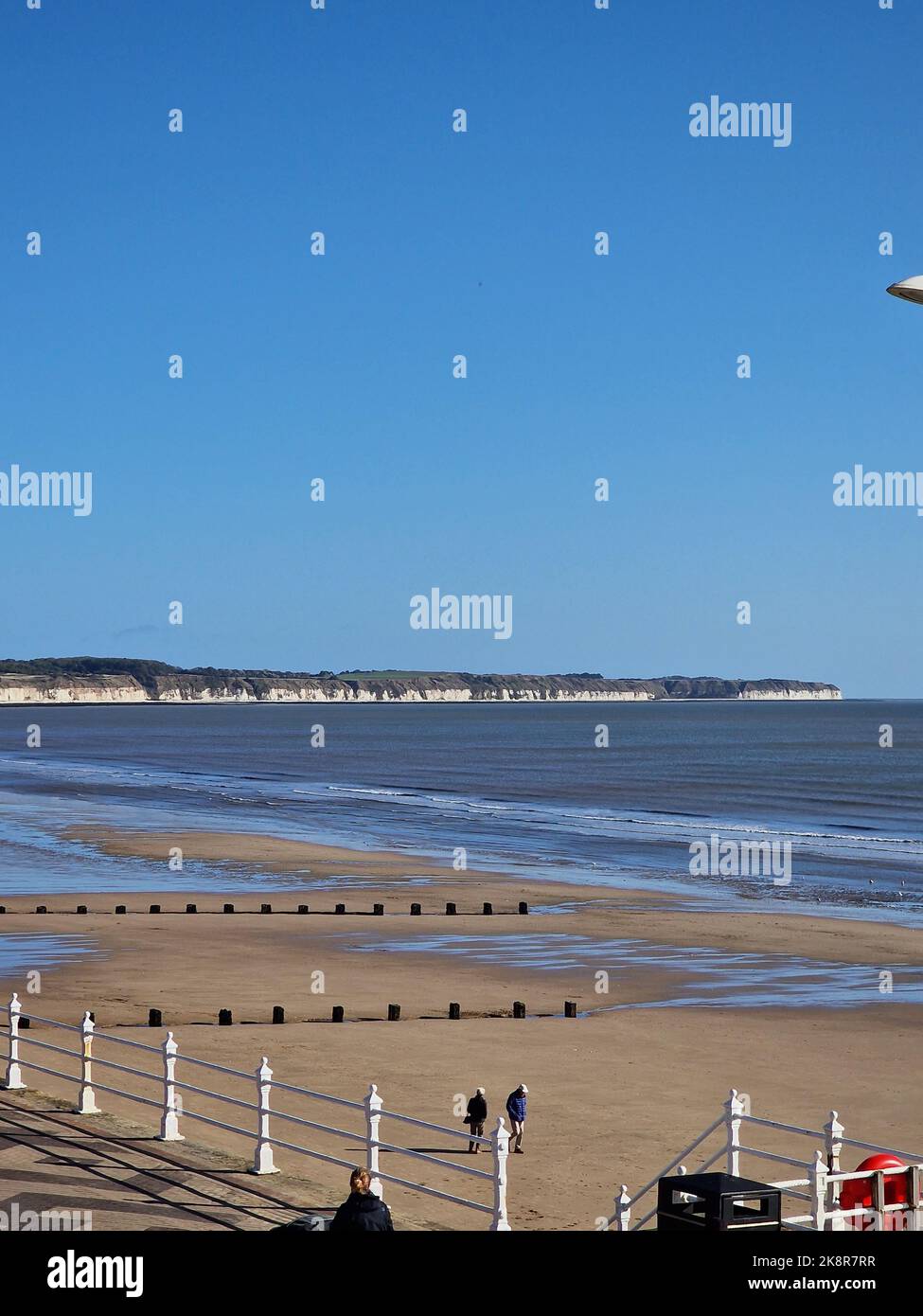 A vertical shot of a sandy beach in Bridlington, Yorkshire, UK Stock ...