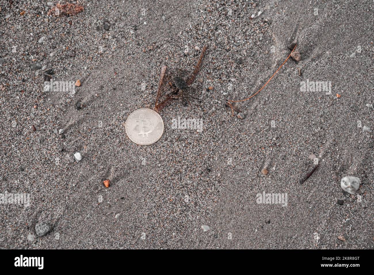 Bitcoin on sand lies background hi-res stock photography and images - Alamy
