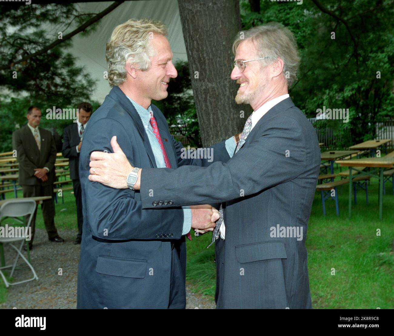 Oslo 19940825 publishing director William Nygaard (TV) welcomes Gudmund ...